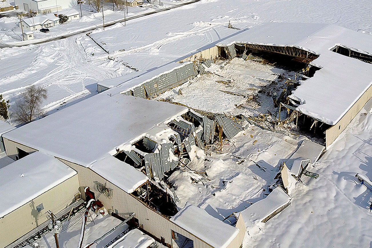Snow-covered buildings collapsing in rare US West weather | HeraldNet.com