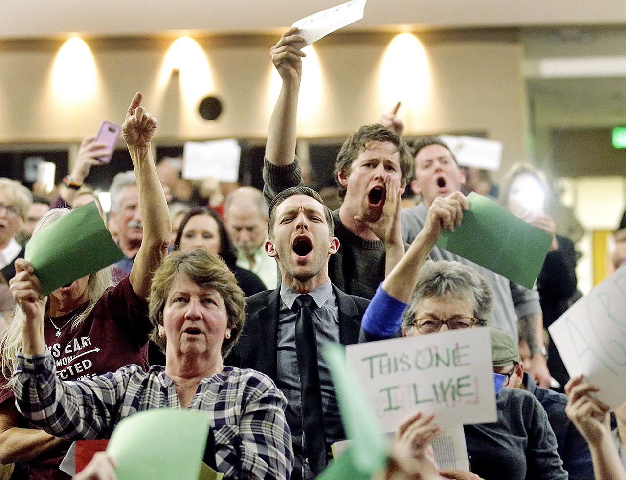 Hostile questions and big crowds swarm GOP town halls | HeraldNet.com