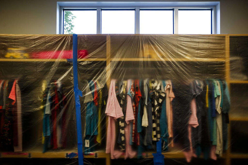 After flood, volunteers spent hours sorting, washing clothes ...