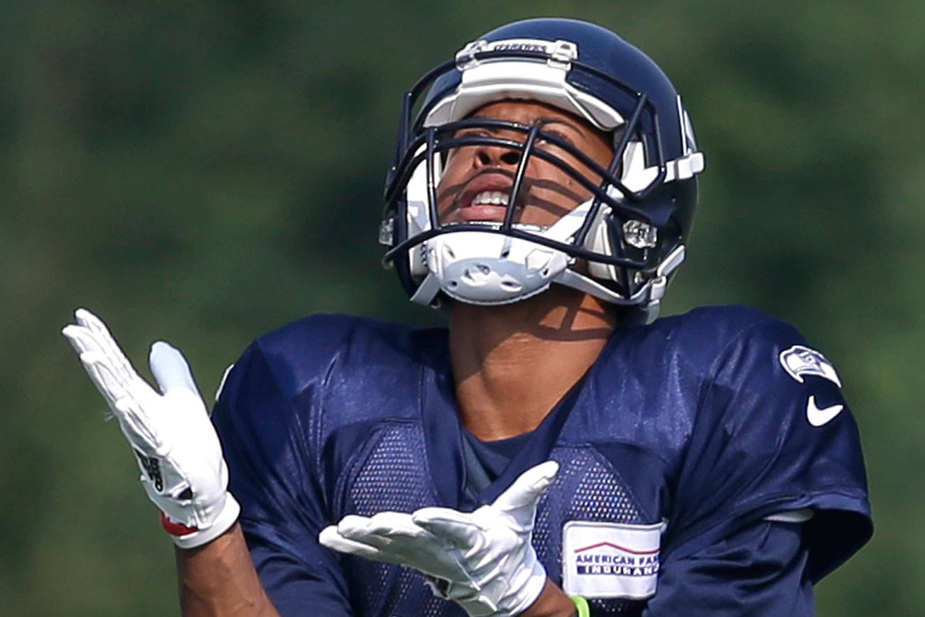 Lockett practices for 1st time since leg injury | HeraldNet.com