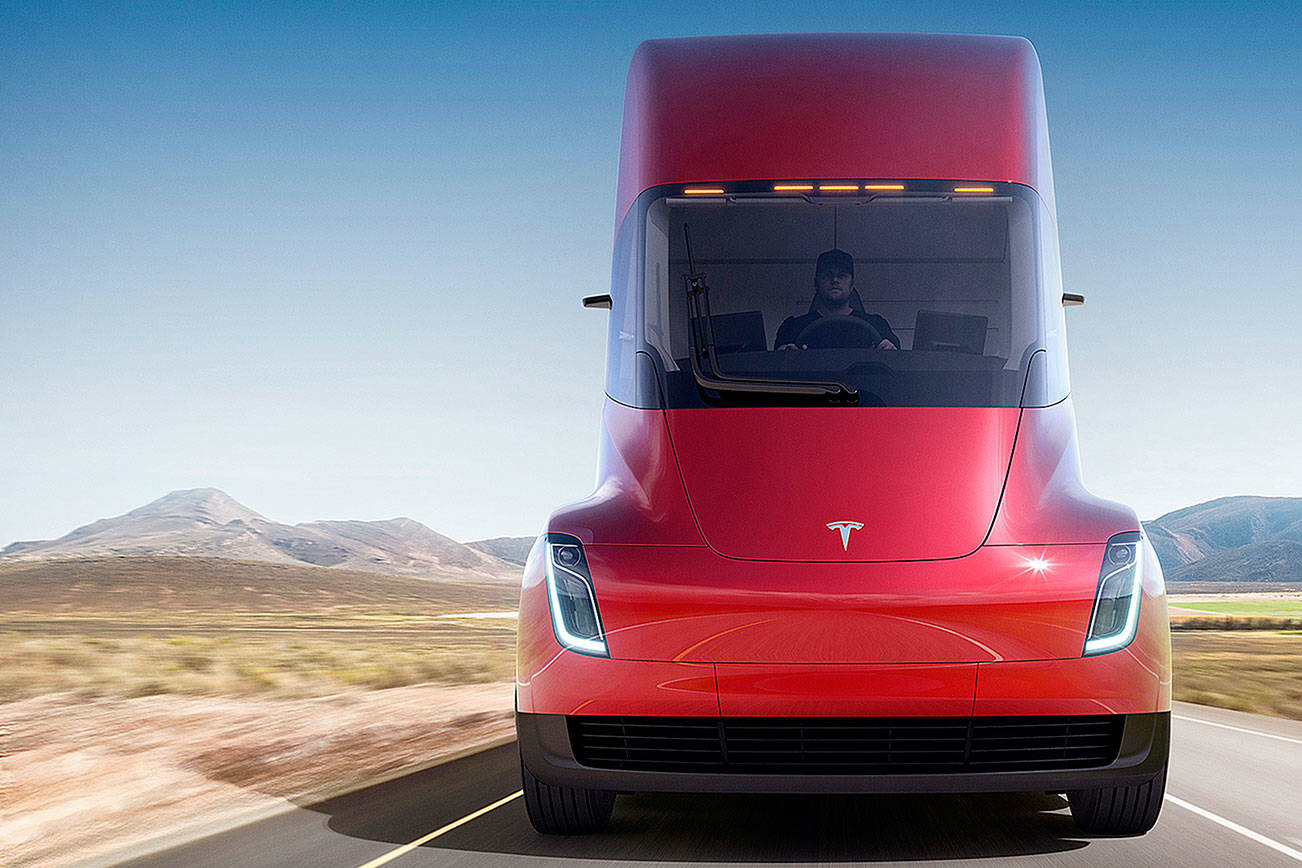 Tesla rolls out the design for its 500-mile electric big rig ...