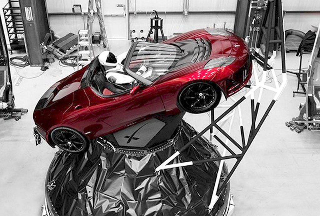 SpaceX ‘Starman’ at wheel of sports car flying on new rocket ...