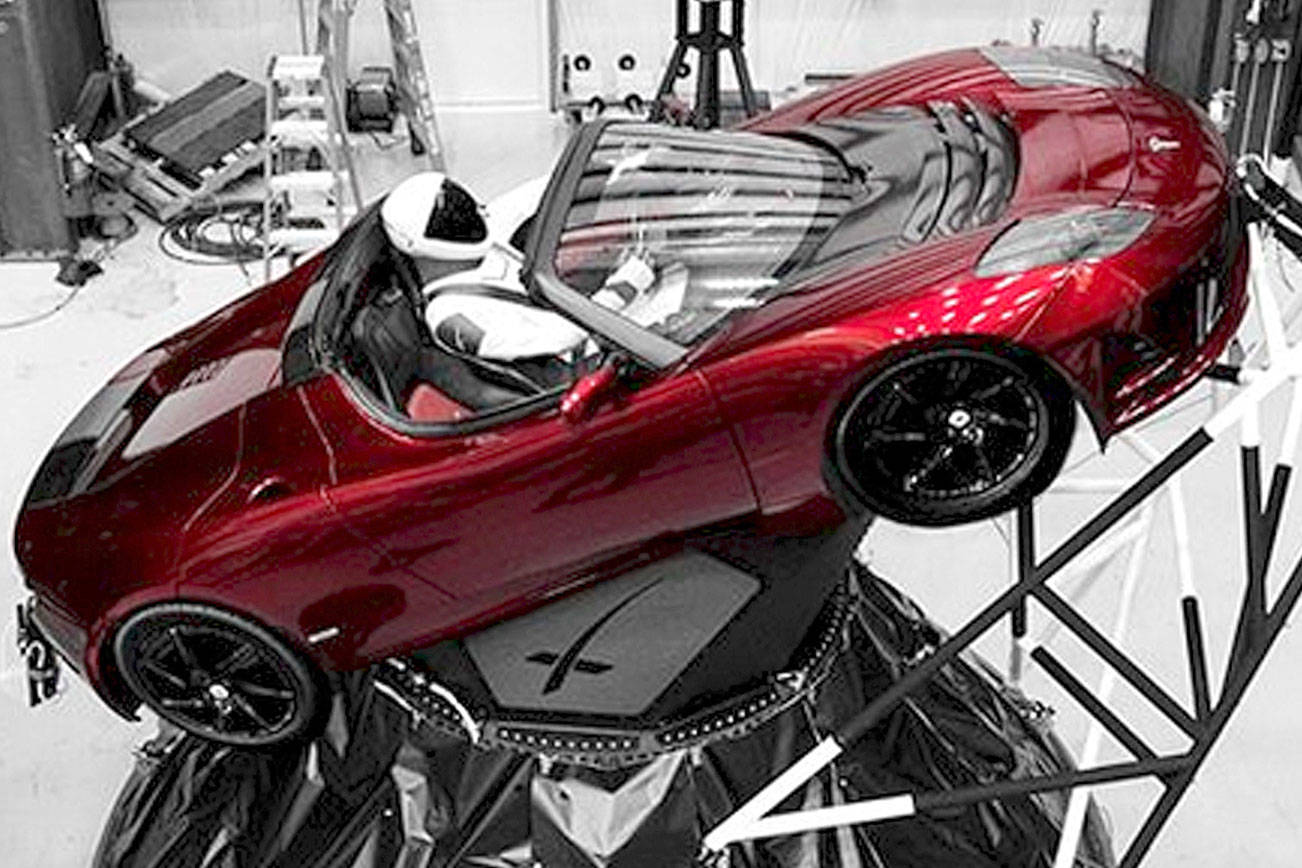 SpaceX ‘Starman’ at wheel of sports car flying on new rocket ...