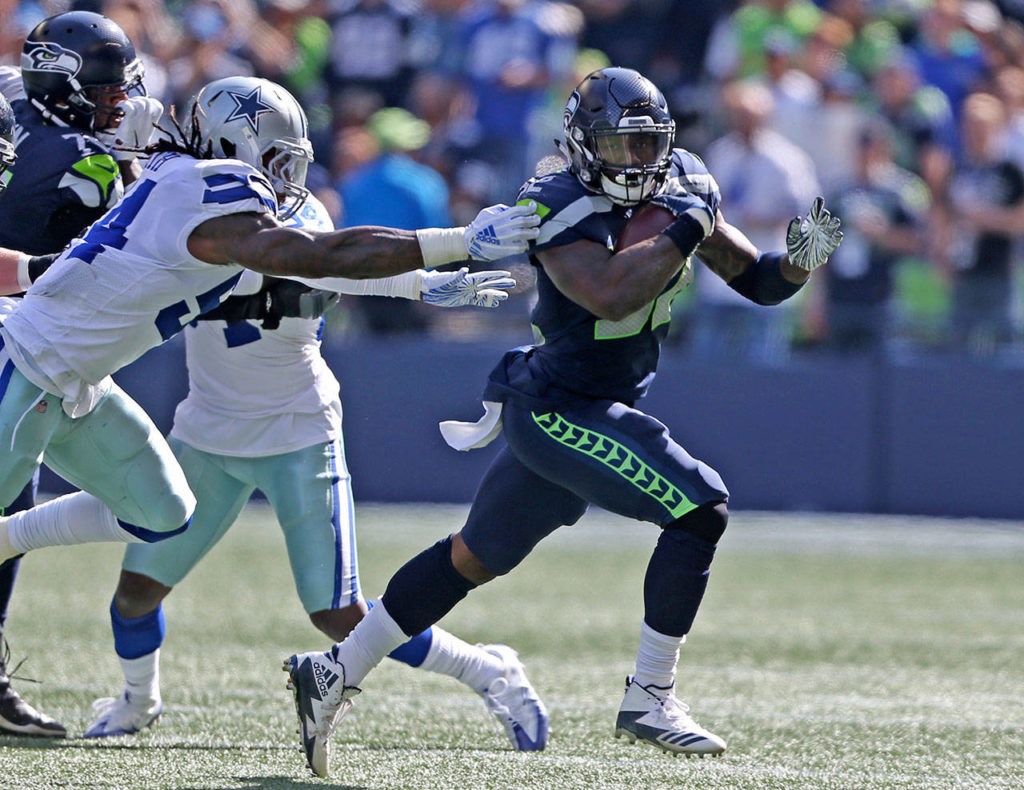 Seahawks keep feeding the ball to ‘tired’ Chris Carson | HeraldNet.com