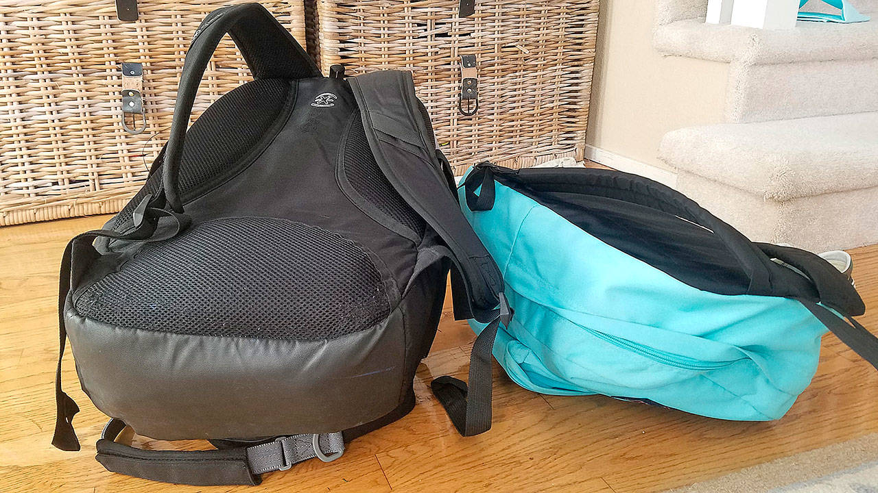 How many children does it take to pick a backpack off the floor ...