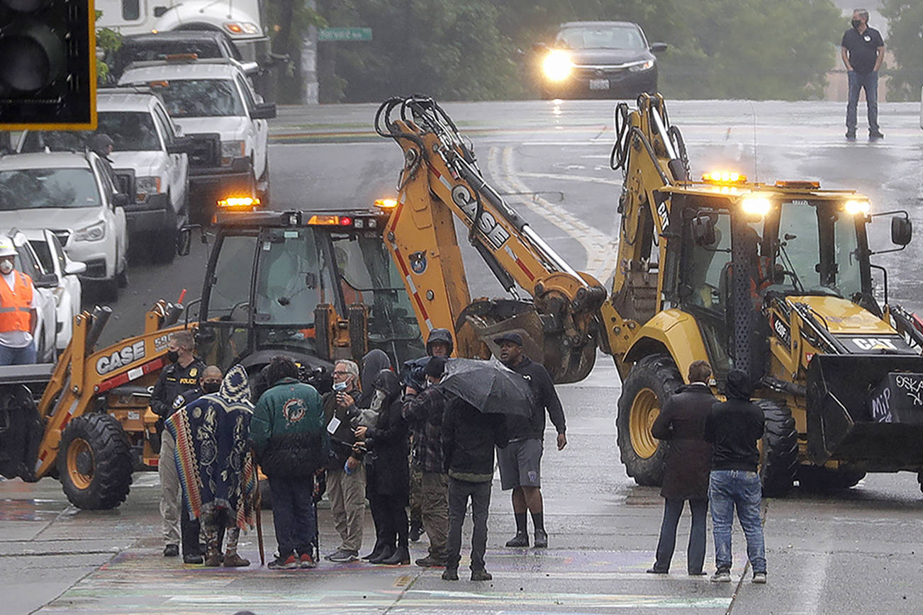 City crews remove some barriers from Seattle protest zone | HeraldNet.com