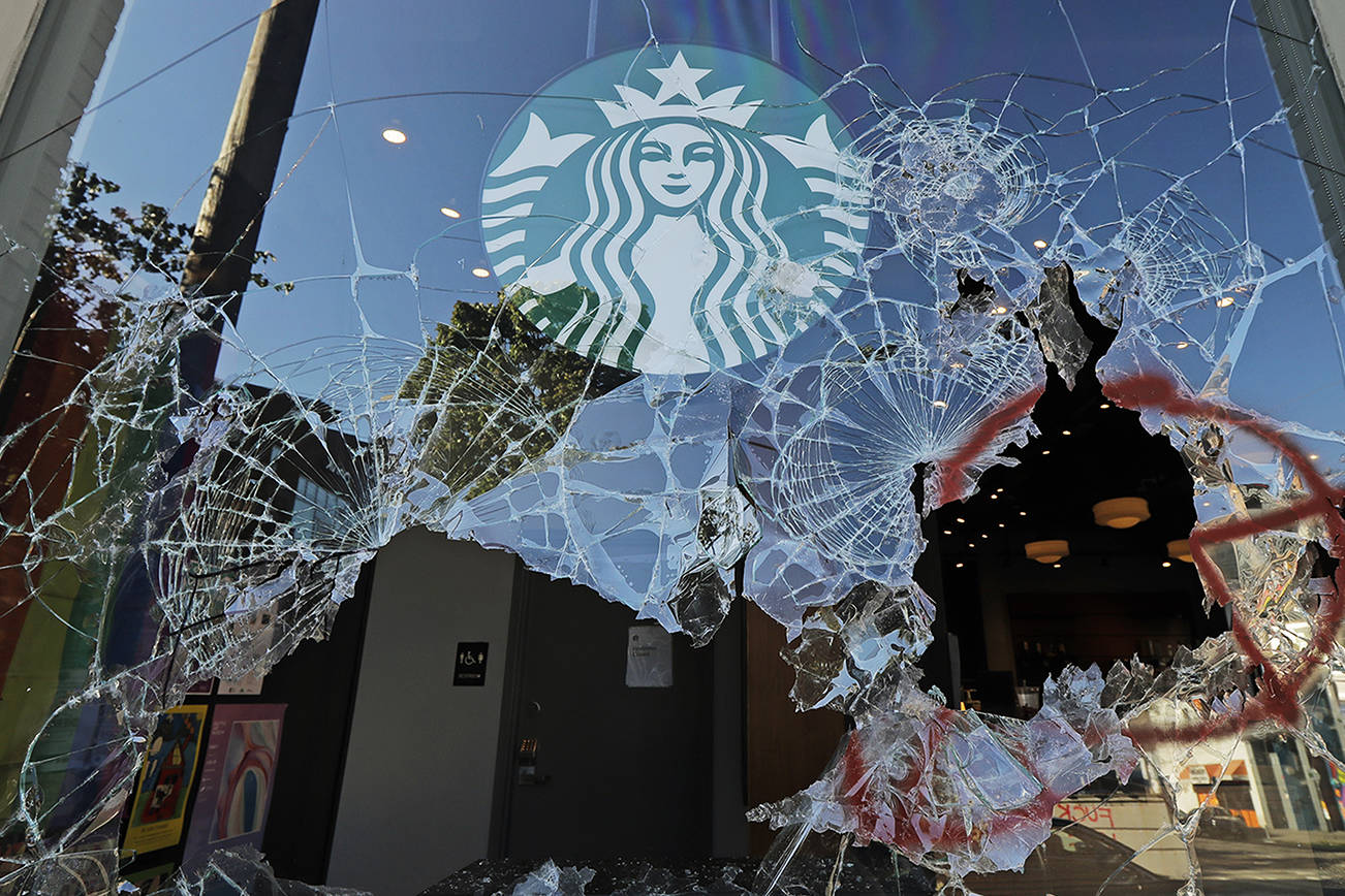 Crowd smashes windows, sets fires on Seattle’s Capitol Hill | HeraldNet.com Crowd smashes windows, sets fires on Seattle’s Capitol Hill | HeraldNet.com
